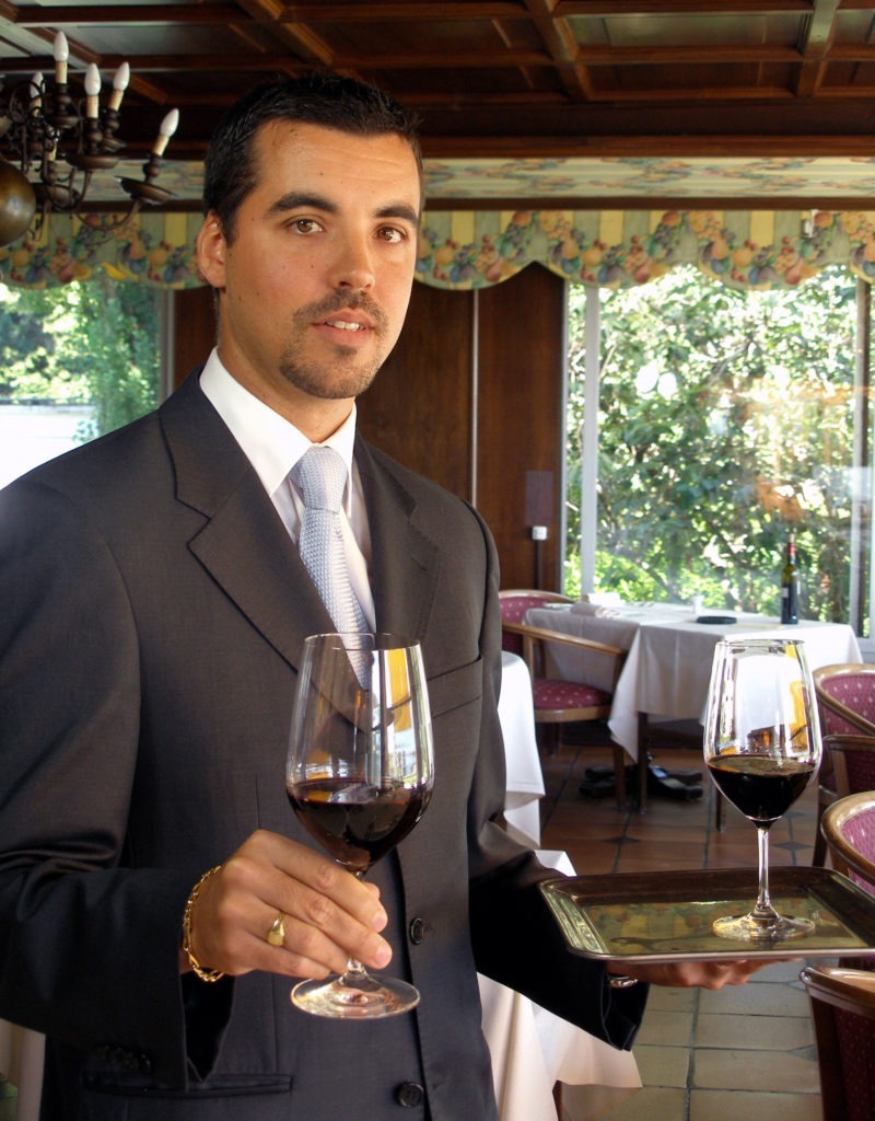 butler is serving wine - Crit Suisse